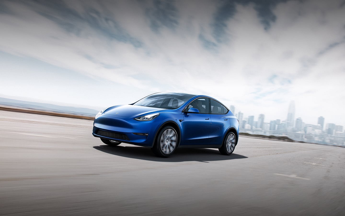 Elon Musk Unveils Tesla Model Y, An Electric SUV That Drives Like a ...