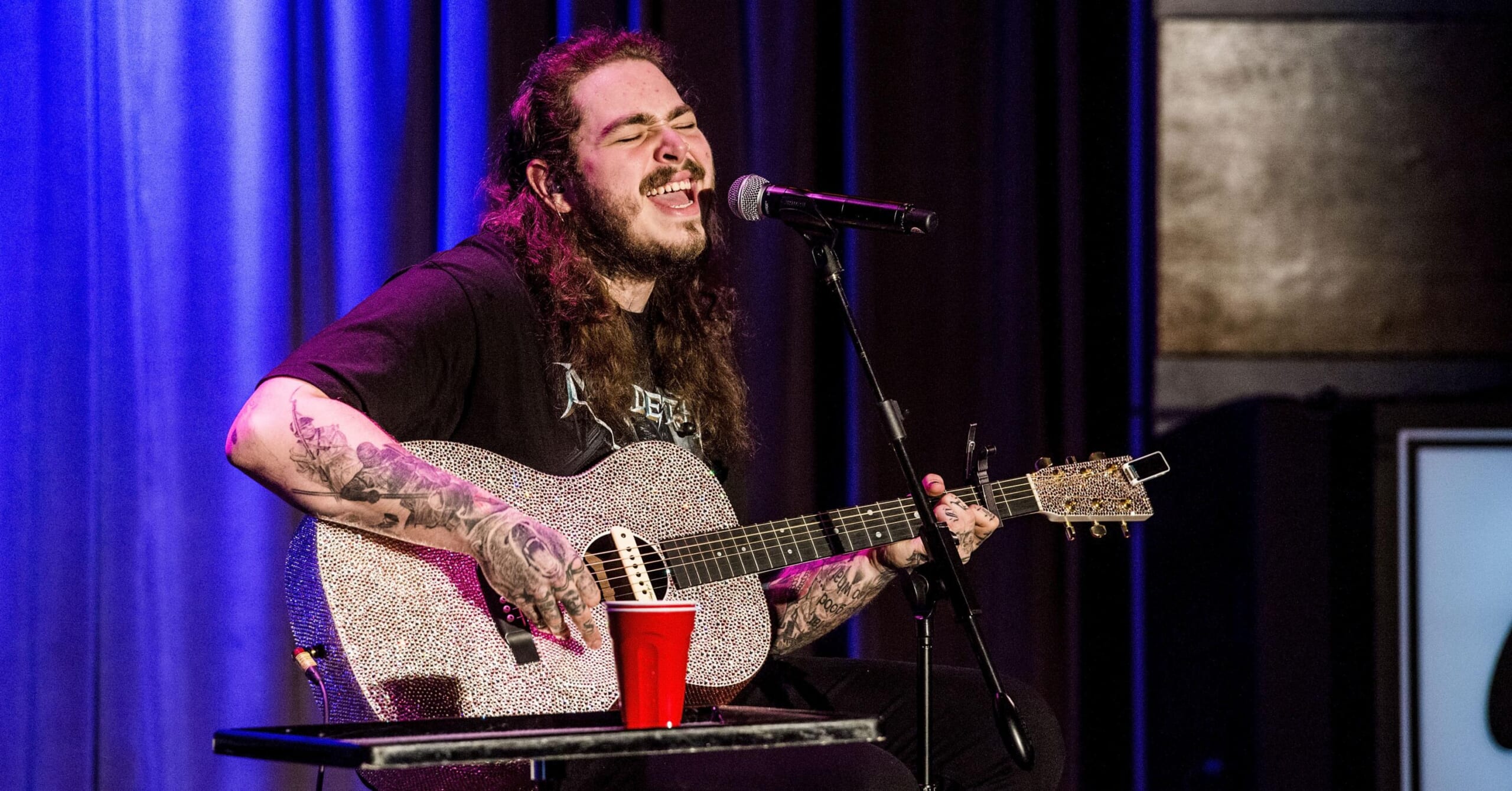 Watch Post Malone Grab a Guitar and Debut His Moody New Sound With ...