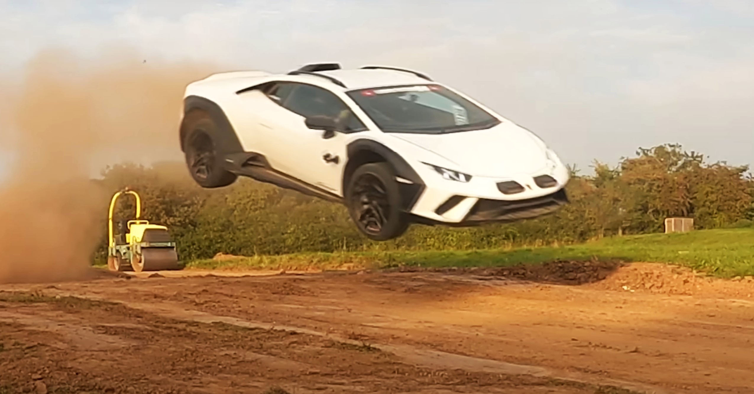 Watch This Lamborghini Huracan Sterrato Soar Off A Dirt Jump - Maxim
